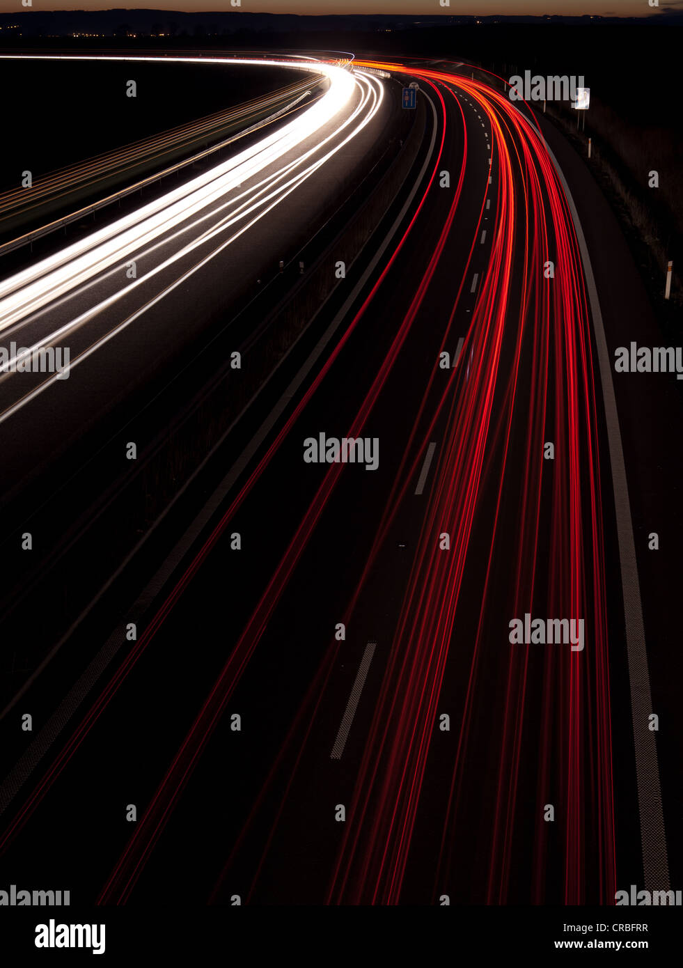 Cars moving fast on a highway Stock Photo - Alamy