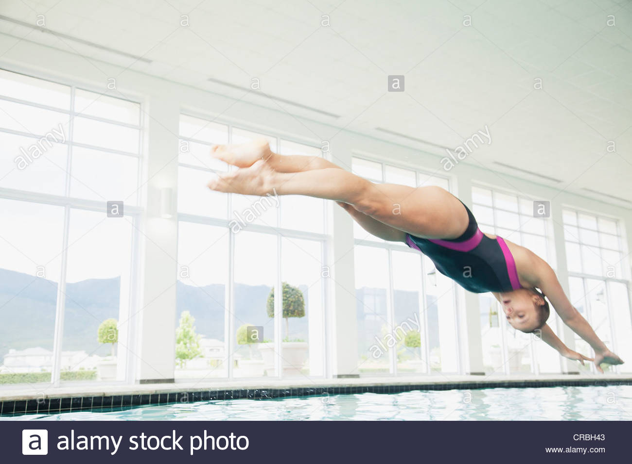 Woman Diving In Swimming Pool Stock Photos & Woman Diving In Swimming ...