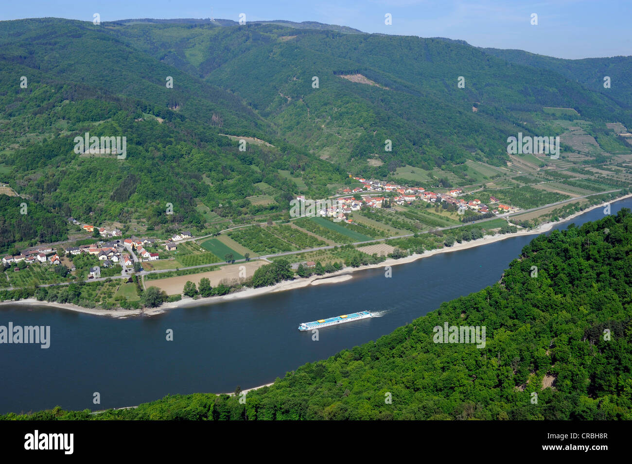 Excursion boat on the Danube river, vineyards, Danube Valley, UNESCO ...