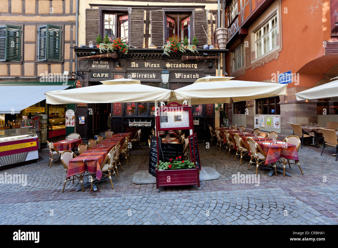 Street with typical wine bars, restaurants and small hotels in the Rue ...