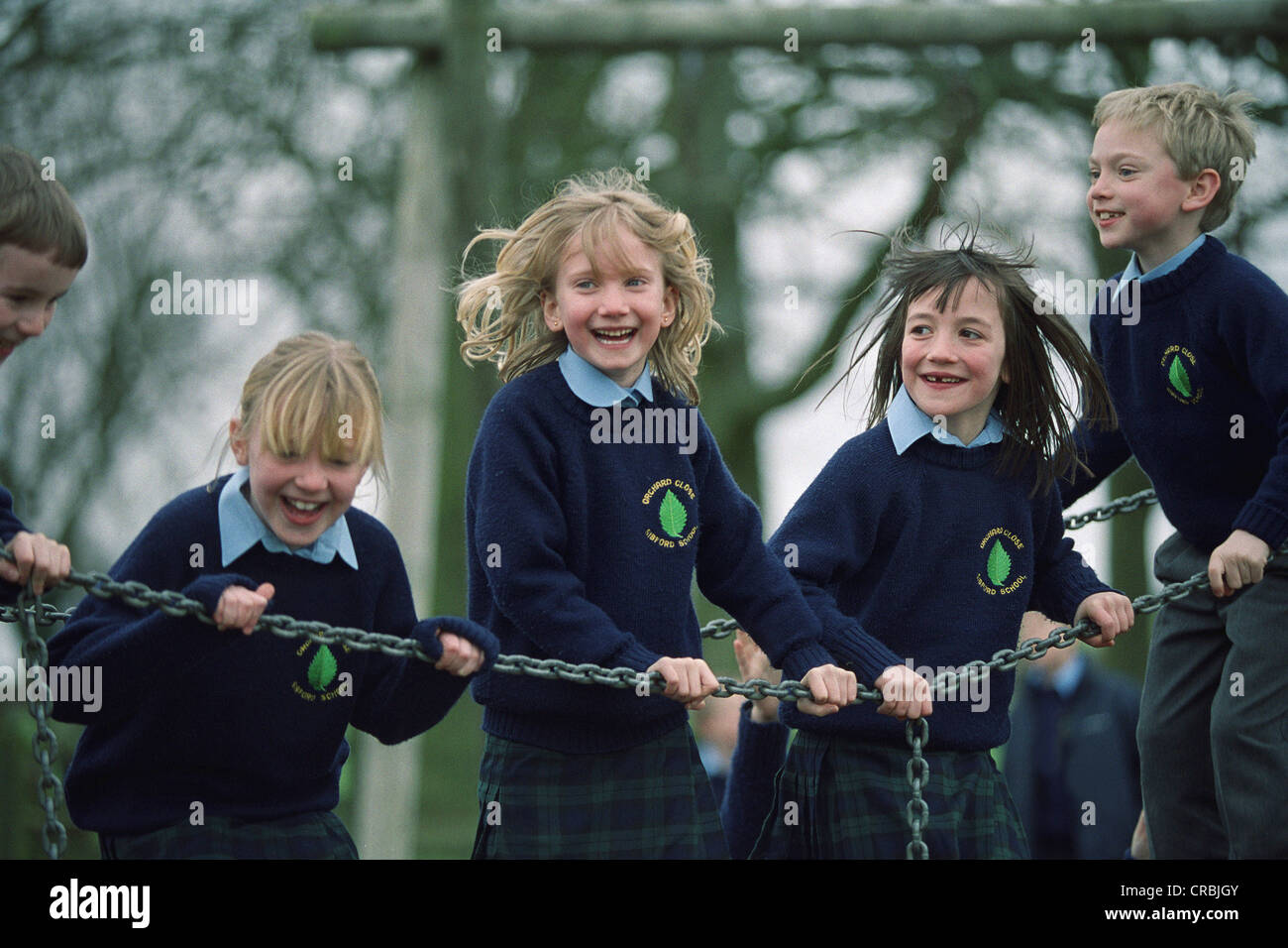 Pupils play in recreation area during lunchtime at Sibford School ...