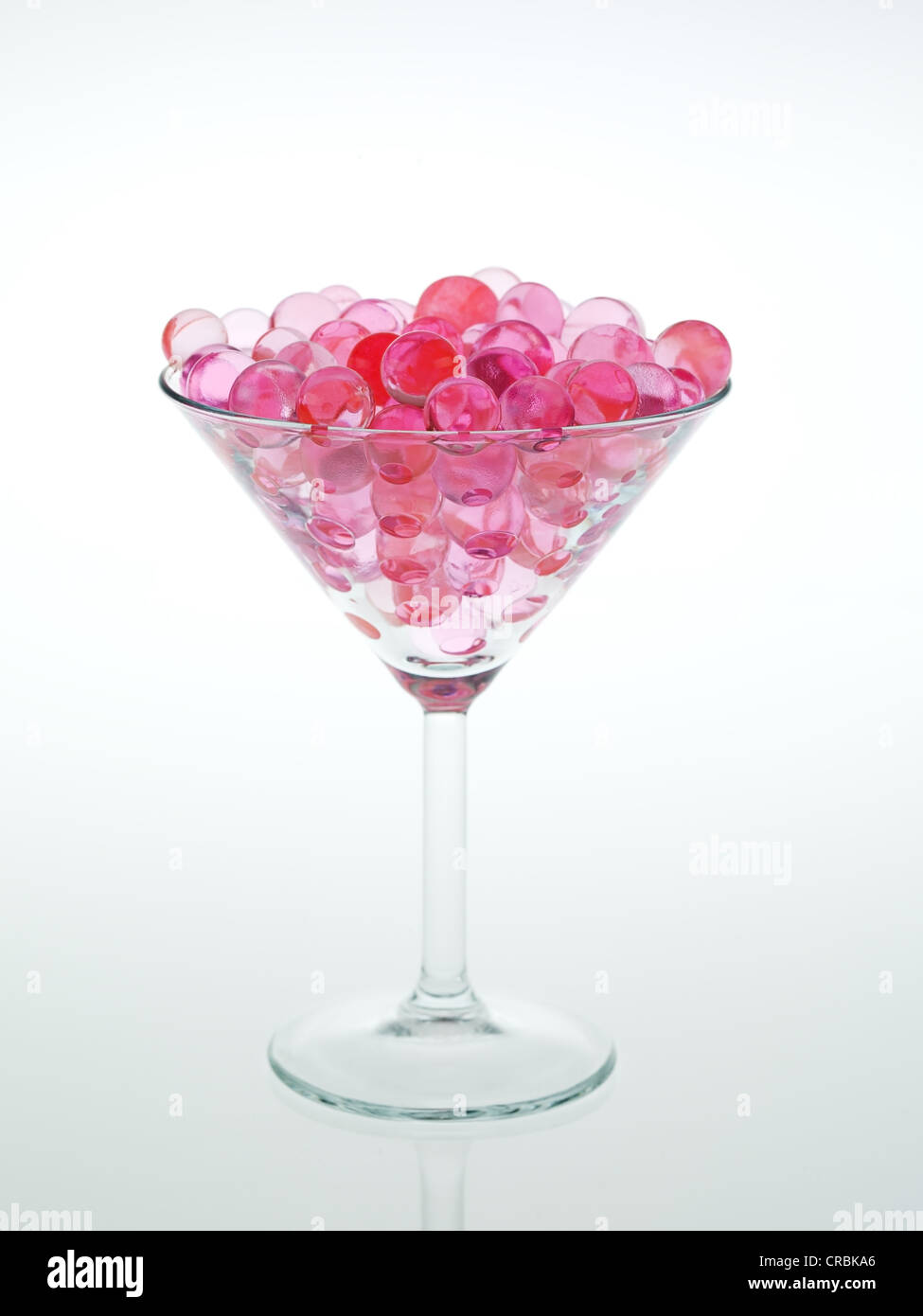 transparent pink glass beads with white background Stock Photo - Alamy