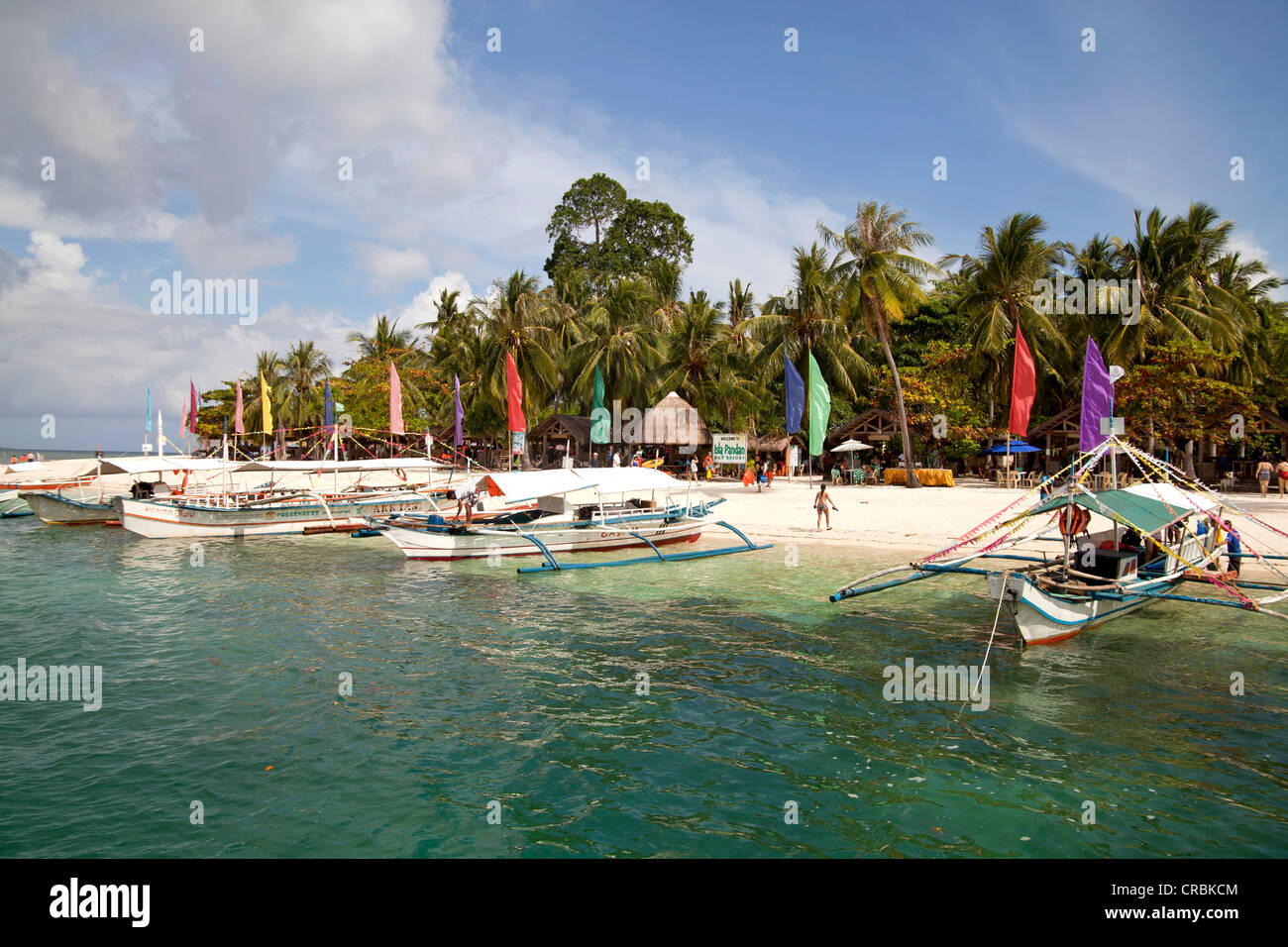 Outrigger boats with day trippers on Pandan Island, Honda Bay, Puerto ...