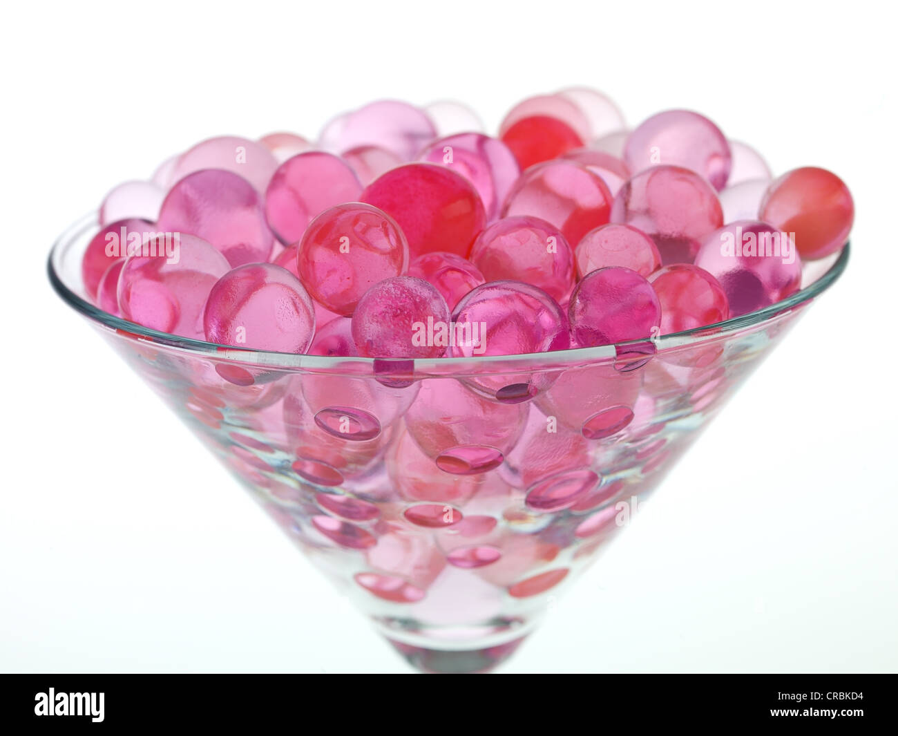 transparent pink glass beads with white background Stock Photo - Alamy