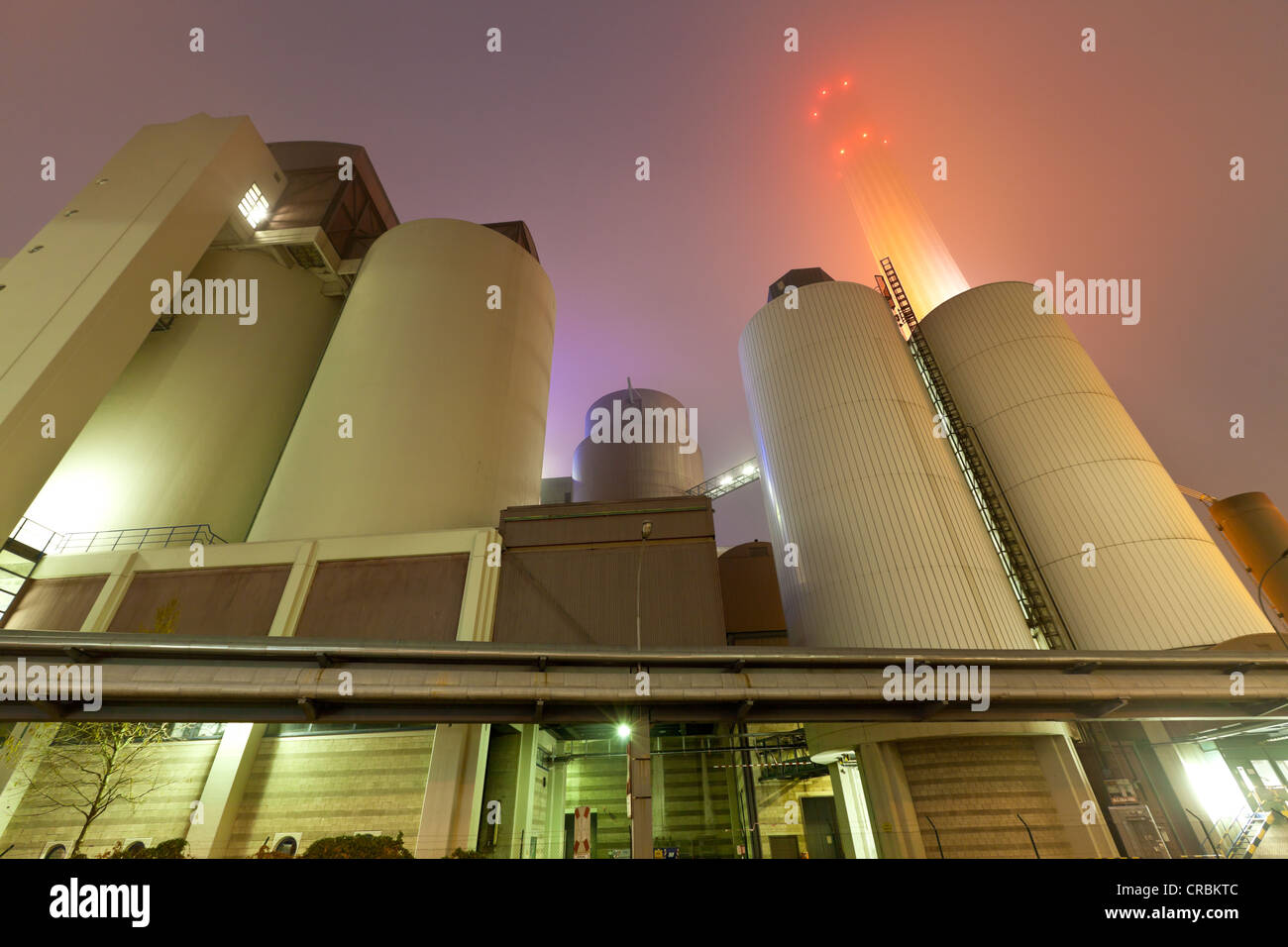 Industrial building, power and heat supply station in fog, Westhafen ...