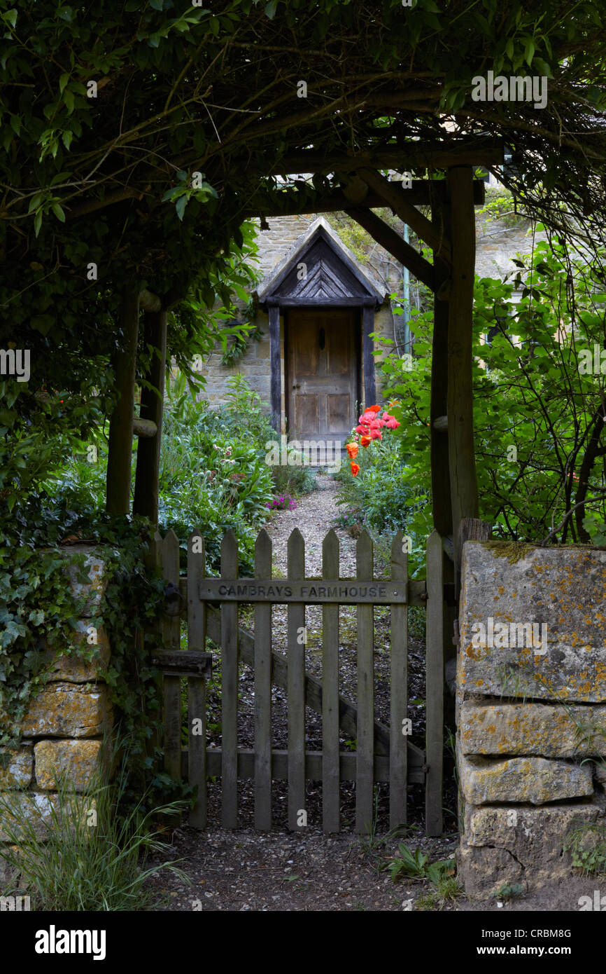 Entrance gate to a house in the Cotswold village of Upper Slaughter ...