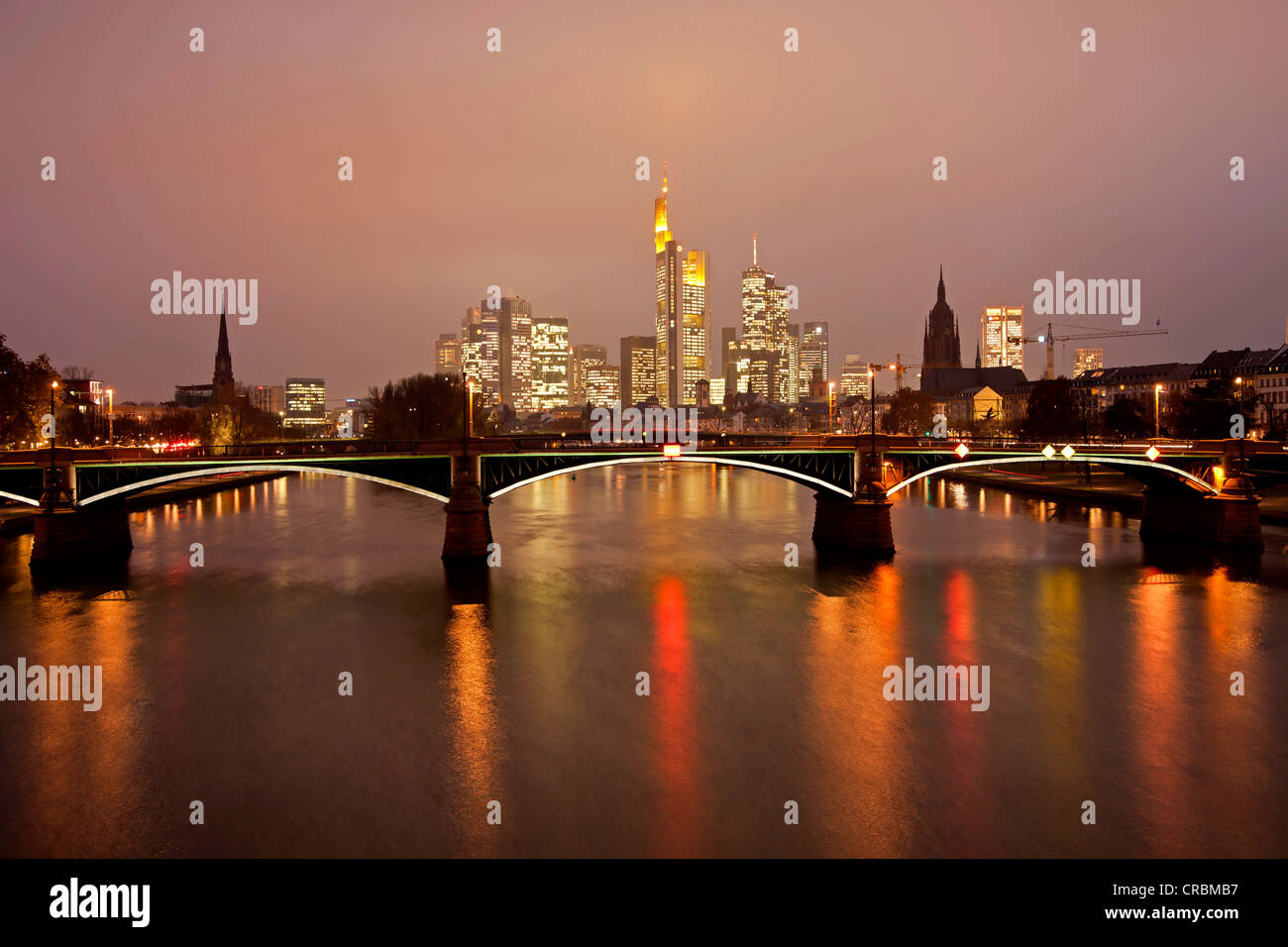 Main river with the illuminated Frankfurt skyline at dusk, Frankfurt am ...