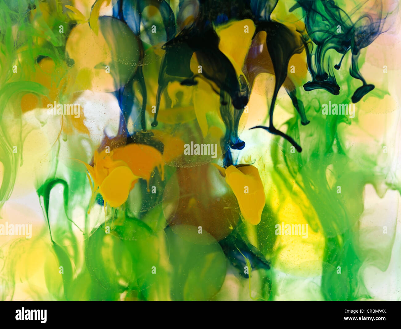 transparent ball under water, green yellow ink colors combined Stock ...