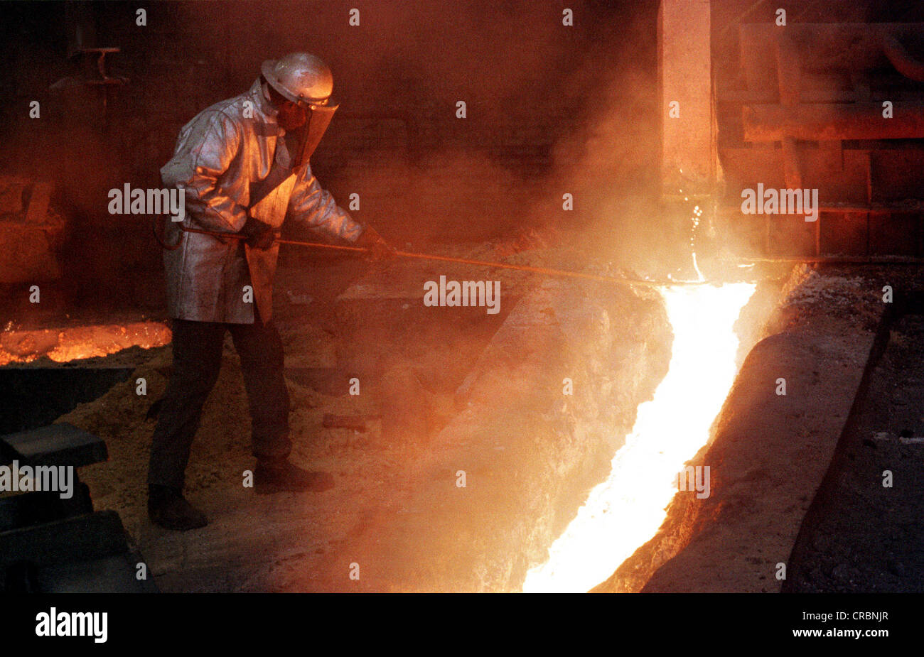 Tapping the blast furnace, steel works Bremen GmbH Stock Photo - Alamy
