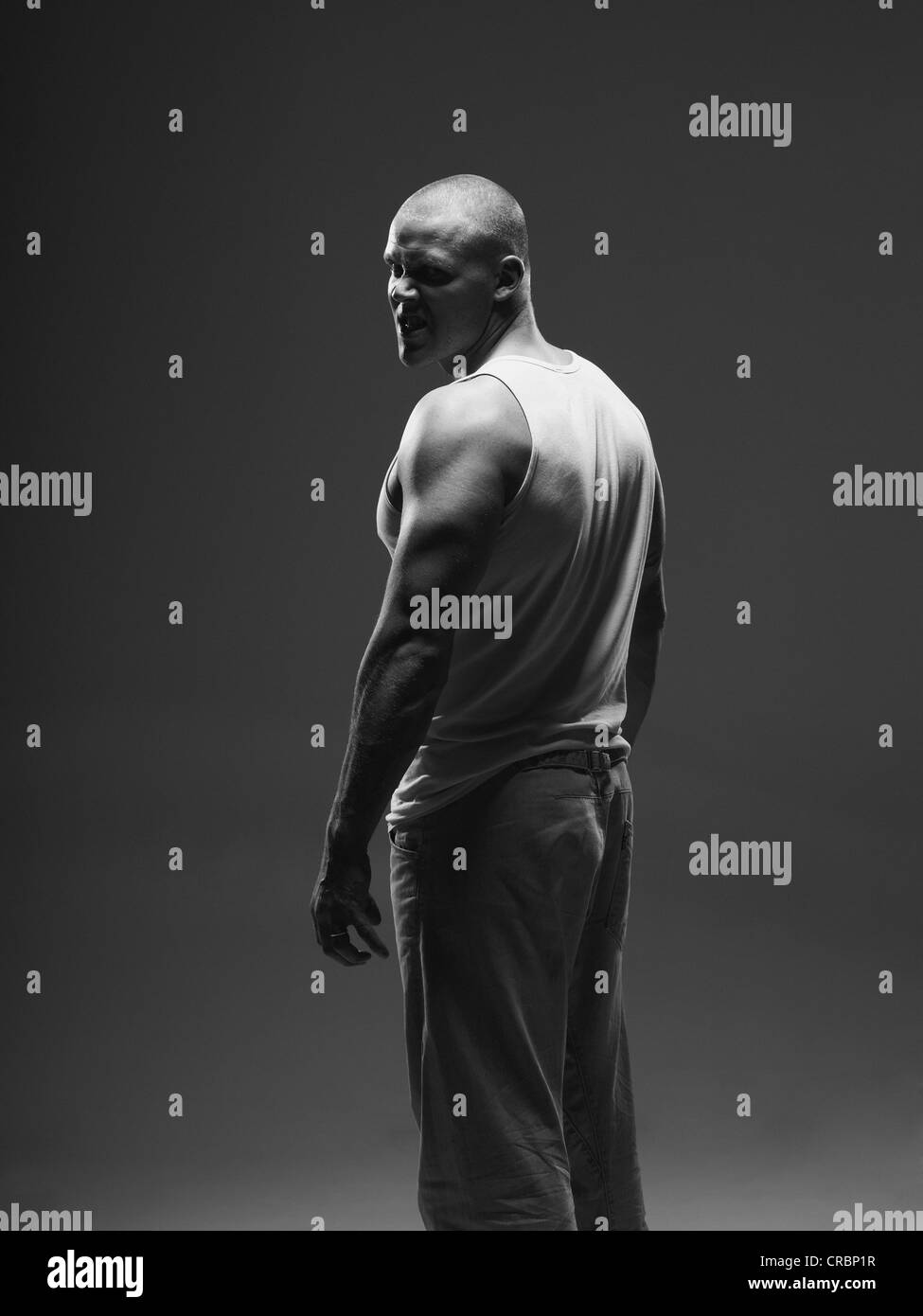 Looking back over his shoulder Black and White Stock Photos & Images ...