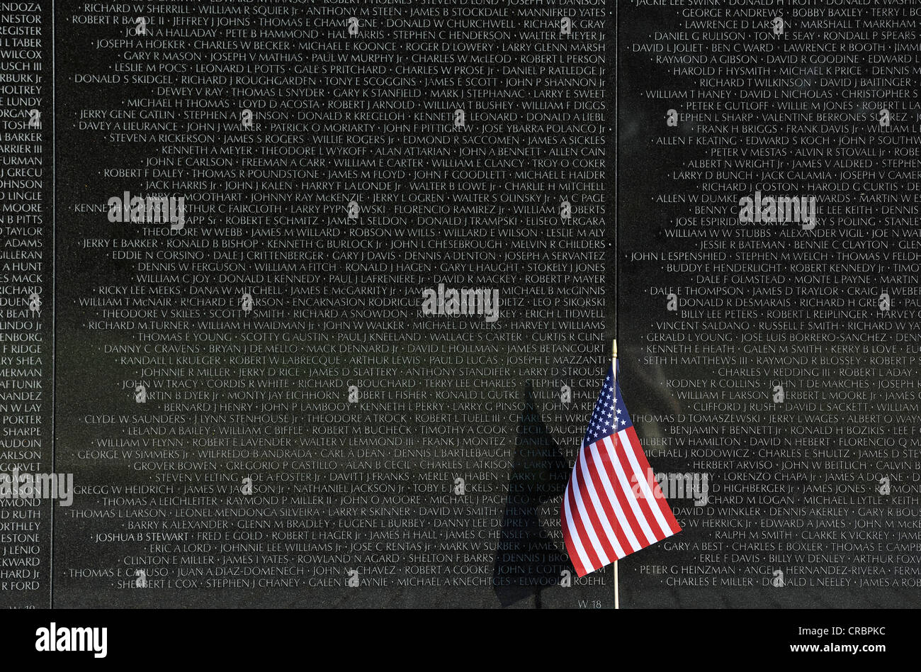 US flag in front of the Vietnam Veterans Memorial Wall, national ...