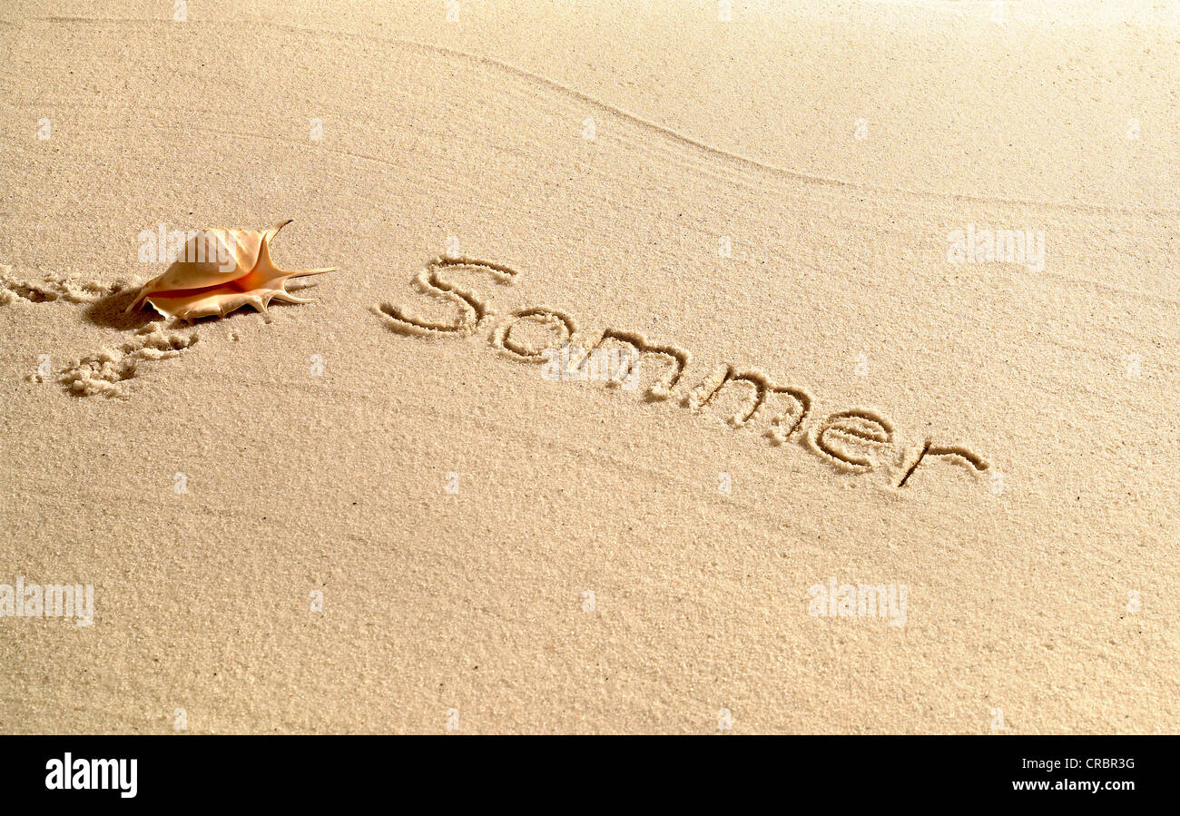 Sommer written in sand Stock Photo - Alamy