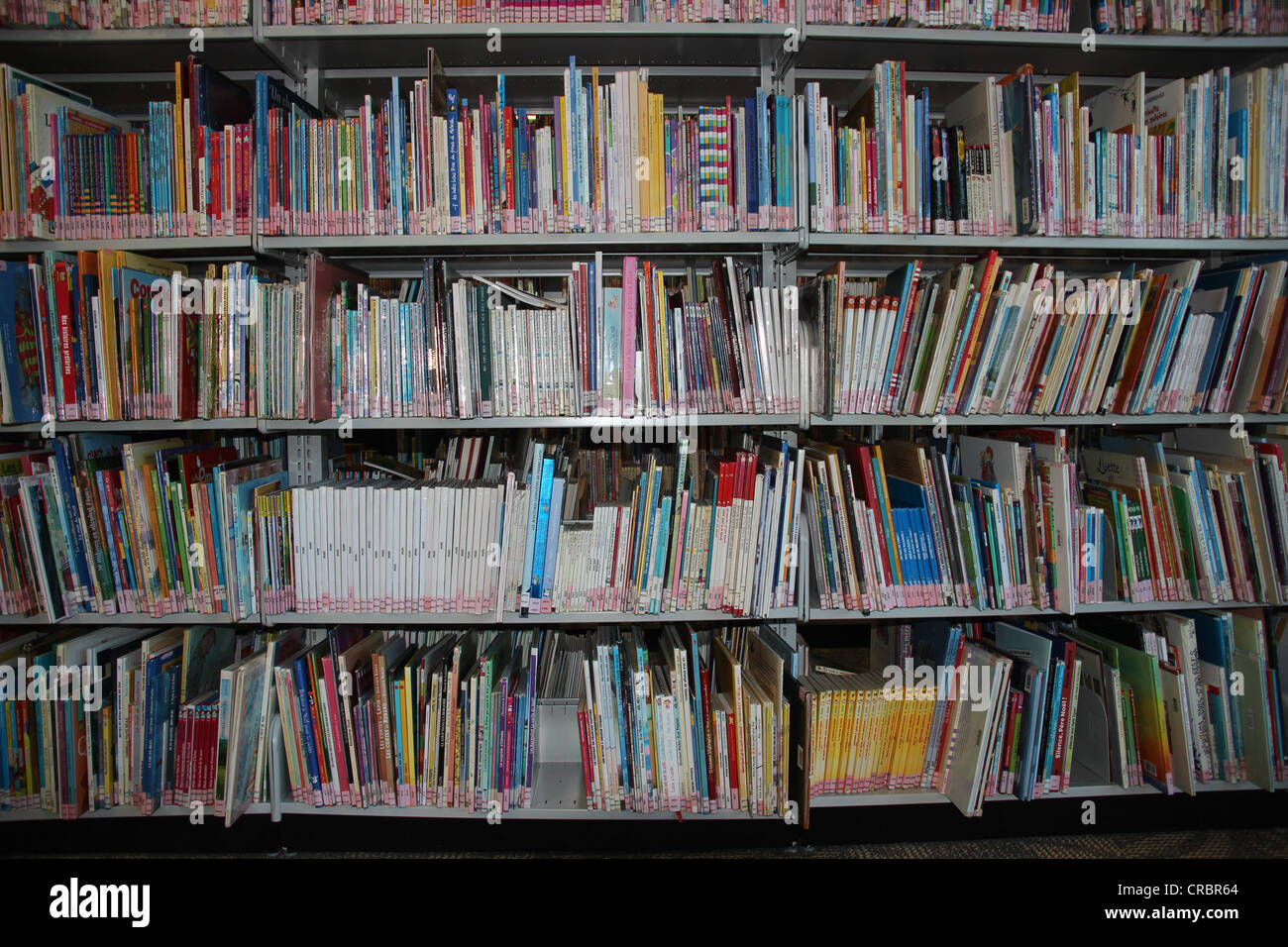 Public library shelves full of library books Stock Photo - Alamy