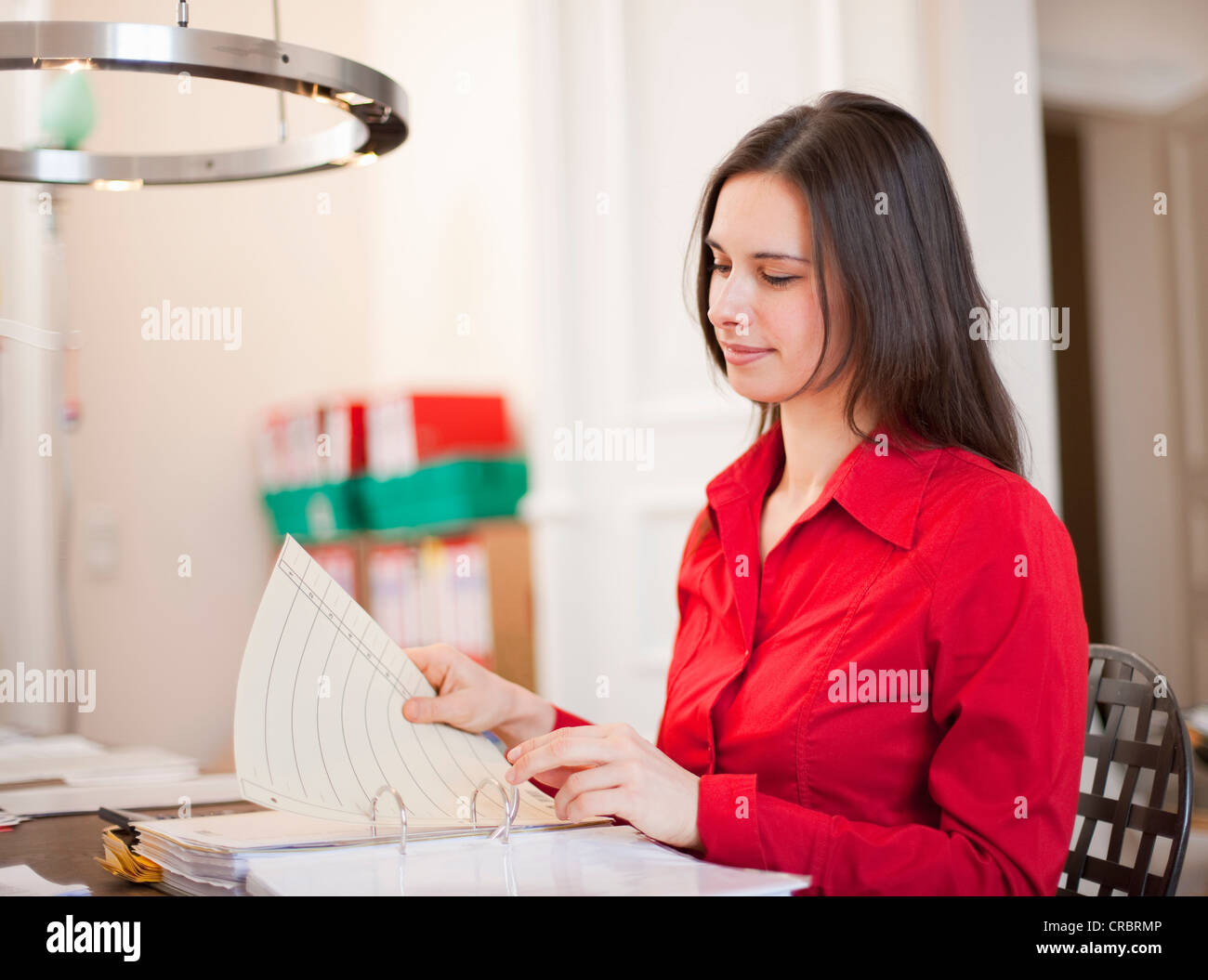 Organizing papers hi-res stock photography and images - Alamy