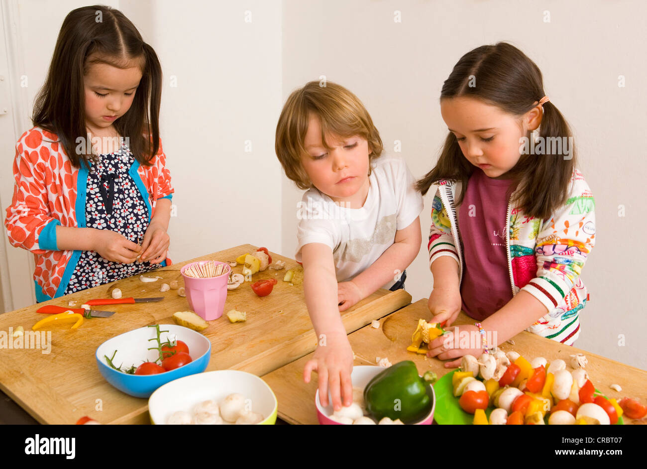 Children cooking together in kitchen Stock Photo - Alamy