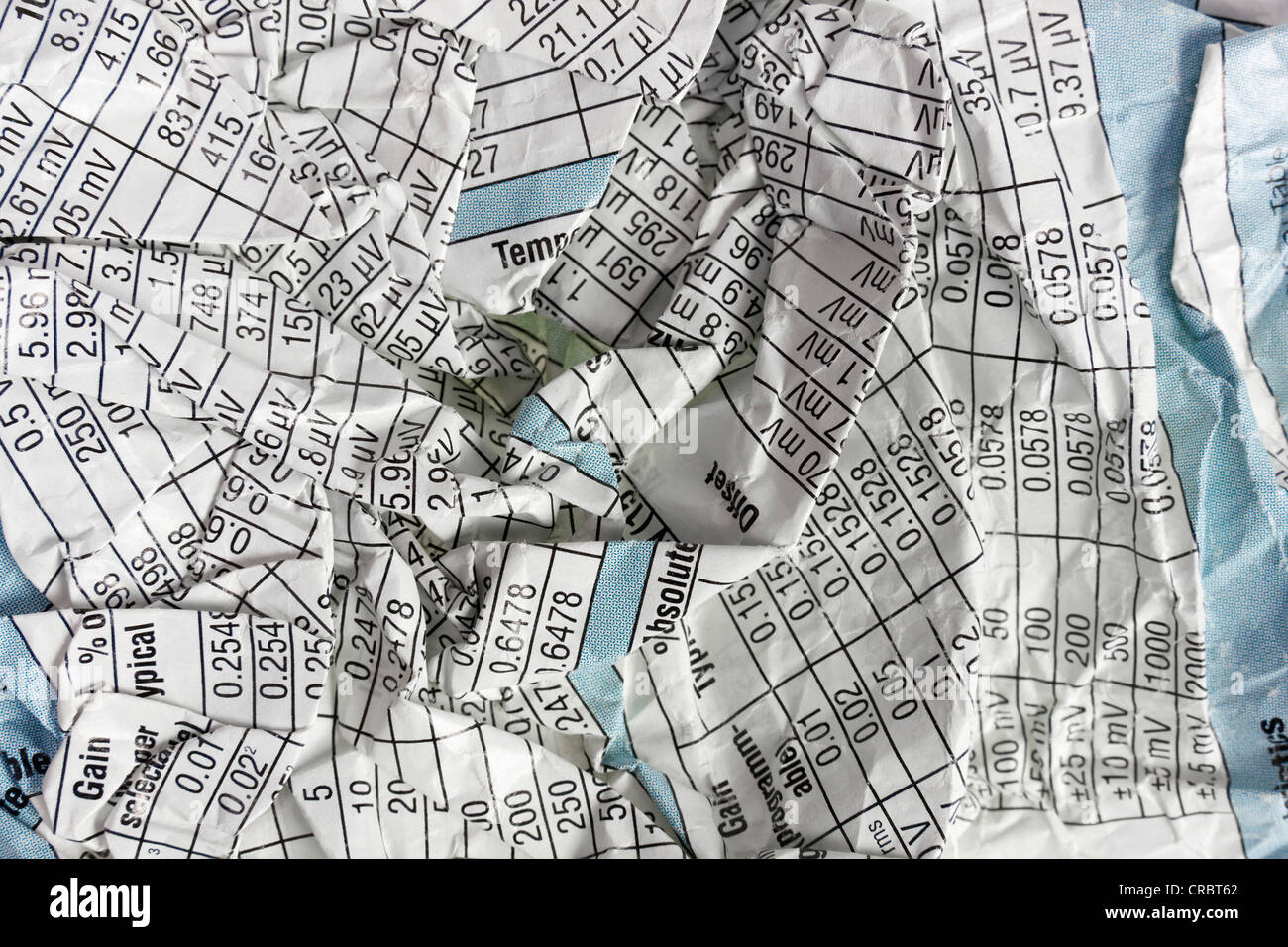 Deformation of the twisted torn crumpled page sheet of white paper. On ...