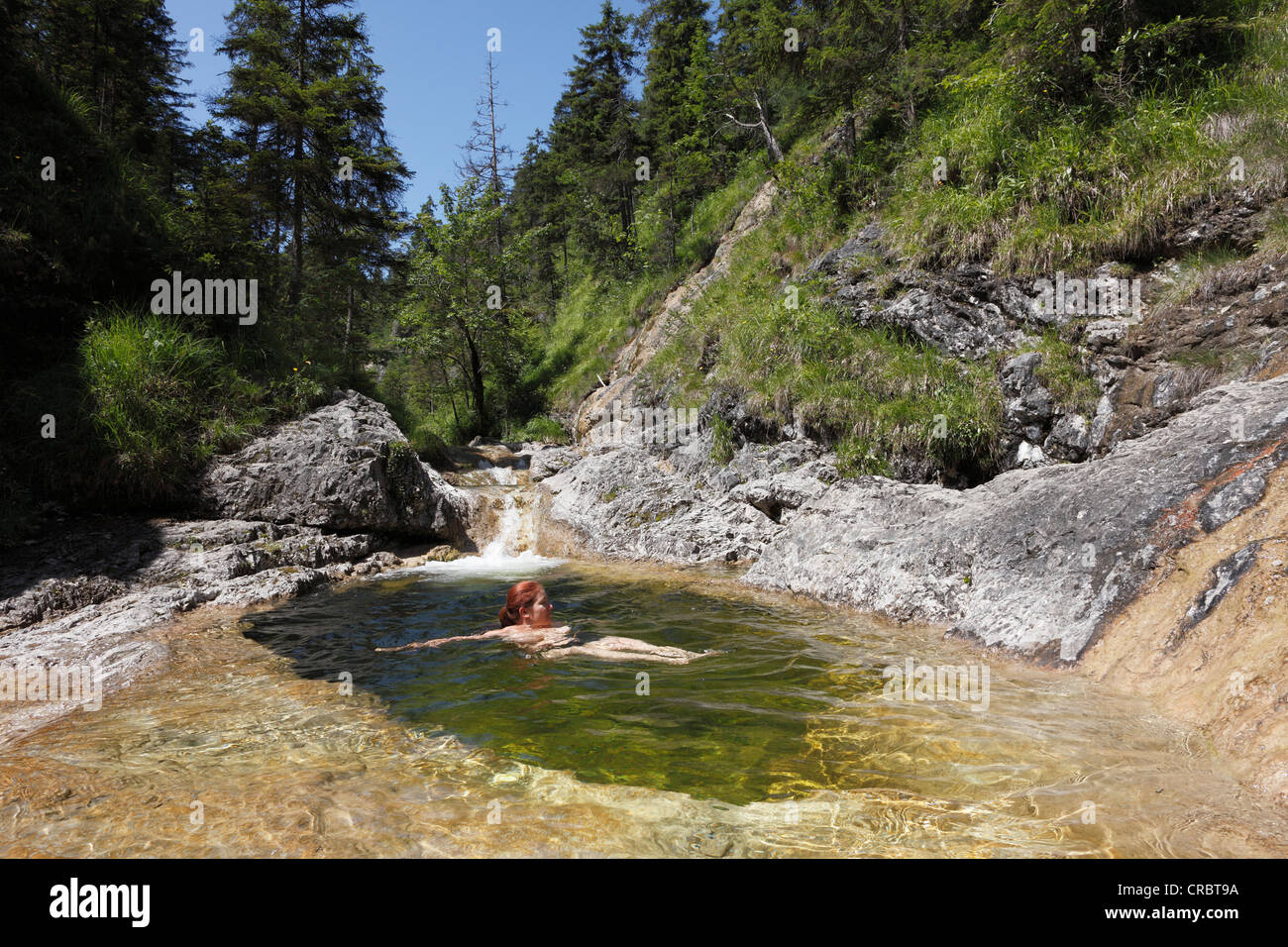 A woman bathing in a stream hi-res stock photography and images - Alamy