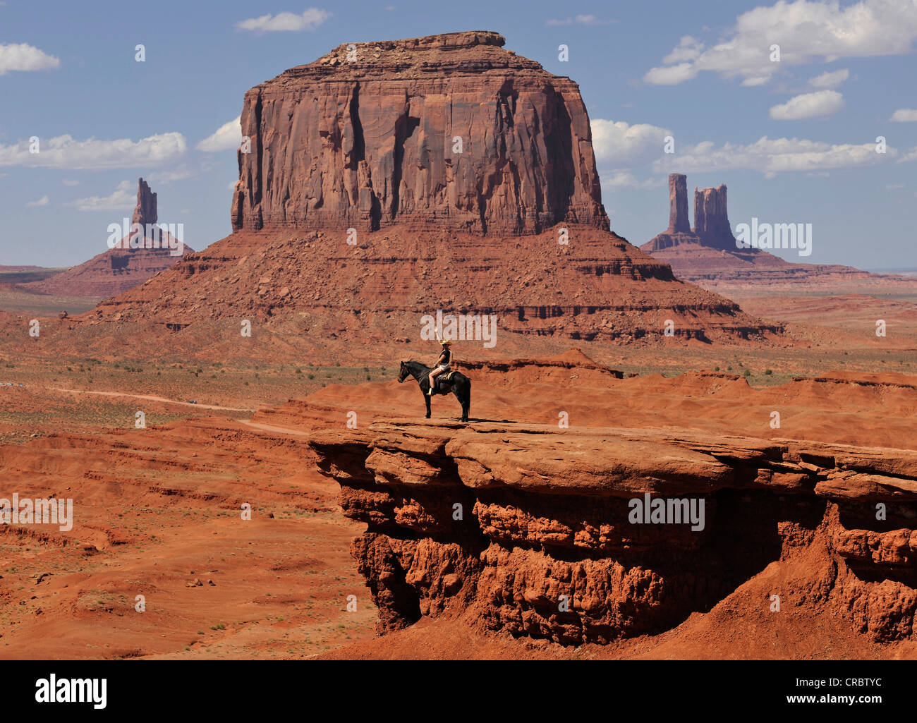 Viewpoint John Ford's Point, tourist on horseback, East Mitten Butte ...