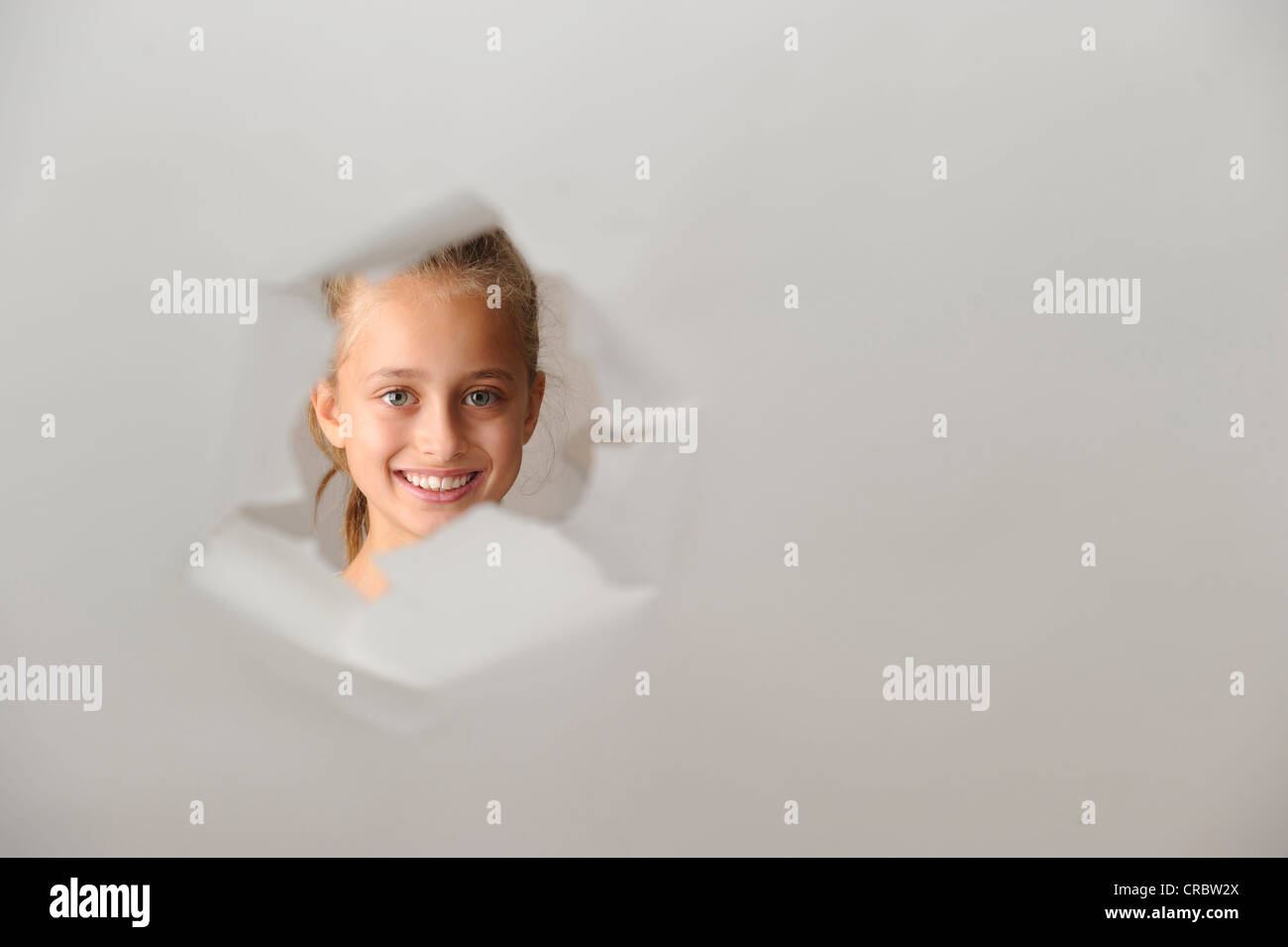Hole in paper hi-res stock photography and images - Alamy