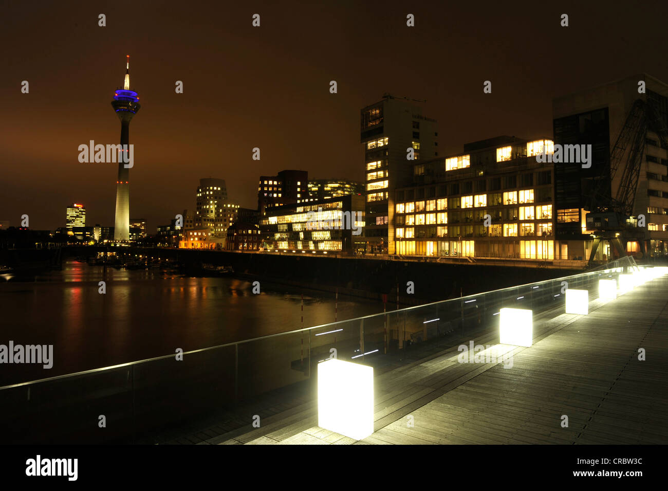 Duesseldorf's Medienhafen, with the Gehry buildings and Rheinturm tower ...