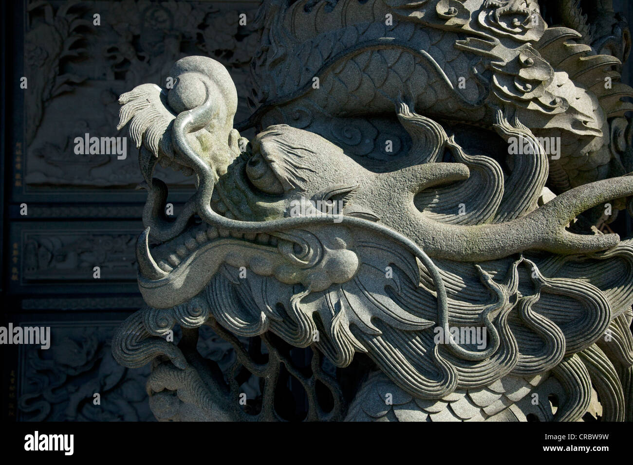 Stone carving of Chinese dragon on pillar of a temple, Jiu Fen, Ruifang ...