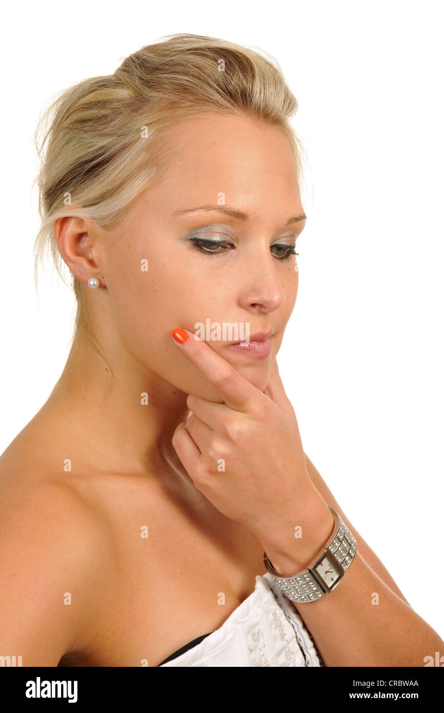 Young woman looking pensive Stock Photo - Alamy