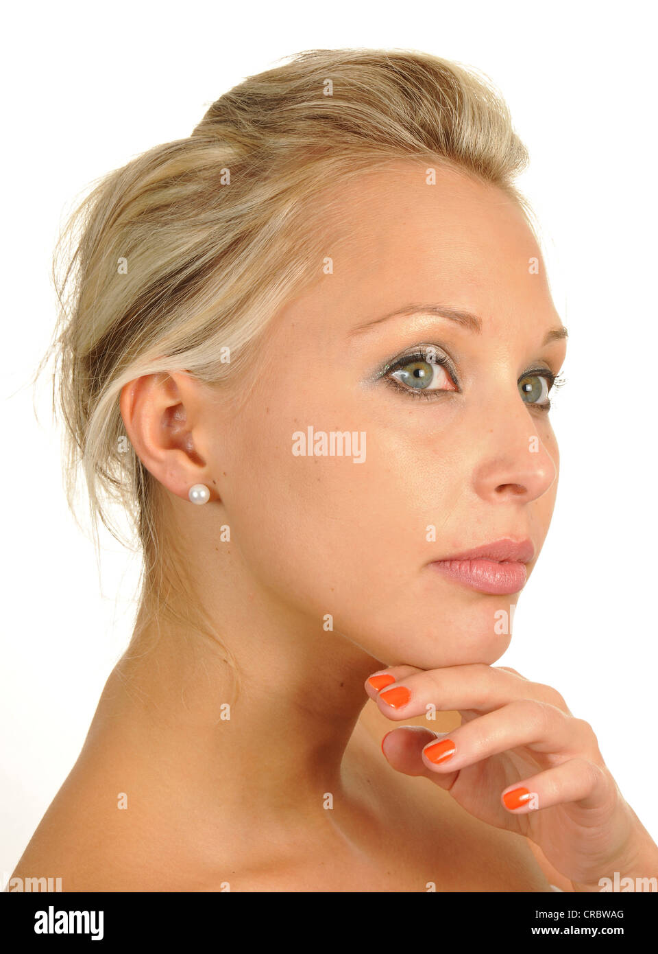Young woman looking pensive Stock Photo - Alamy