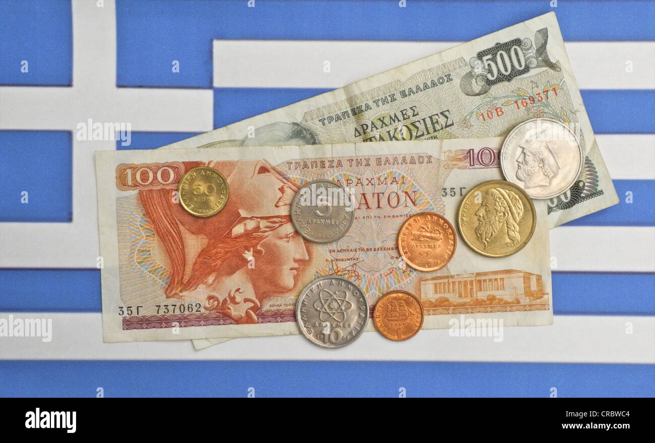Drachma Greek currency on the flag of Greece Stock Photo - Alamy