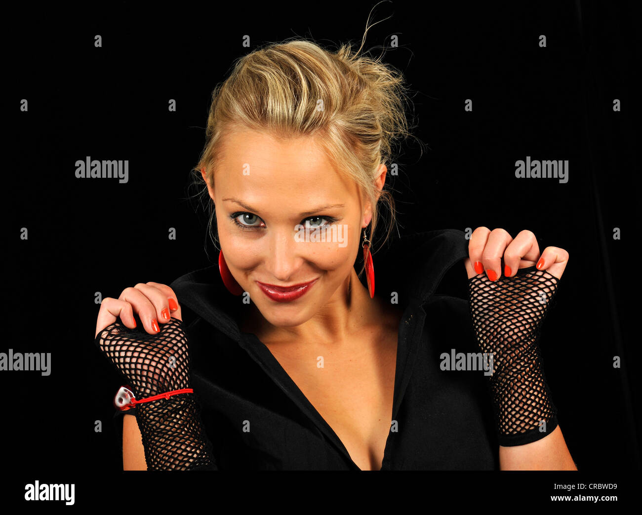 Young woman, vamp, showing claws Stock Photo - Alamy
