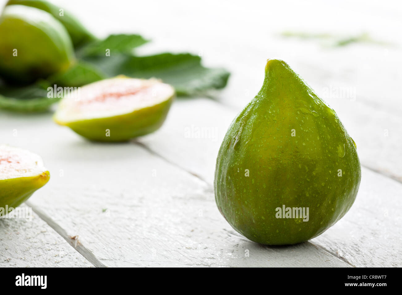 Green Fioroni Figs on White Wood Stock Photo - Alamy