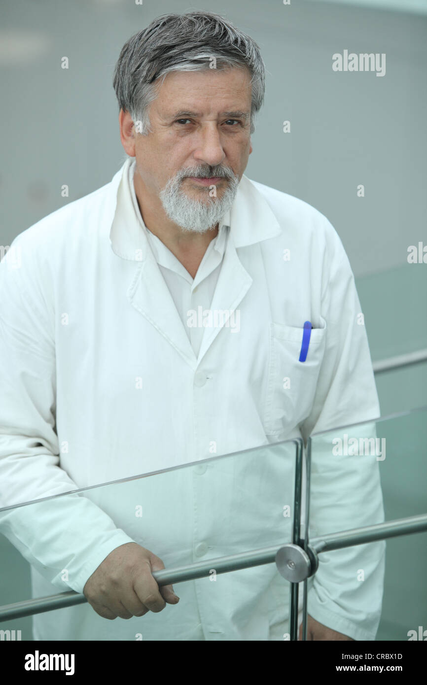 Renowned scientist/doctor in a research center/hospital looking ...