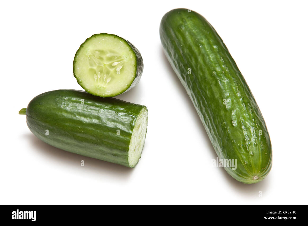 Mini Cucumbers isolated on a white studio background Stock Photo - Alamy