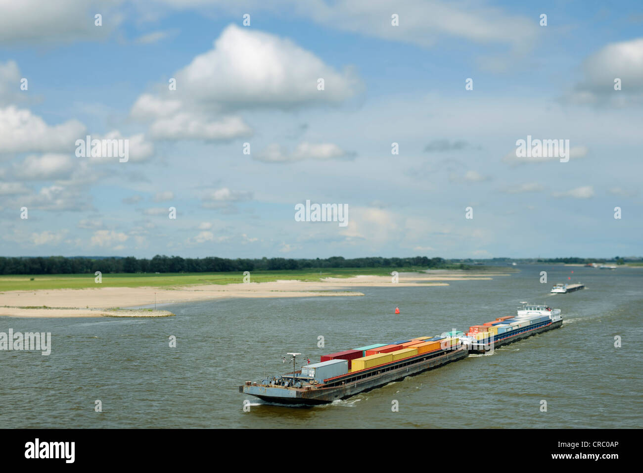 Barge carrying shipping containers hi-res stock photography and images ...