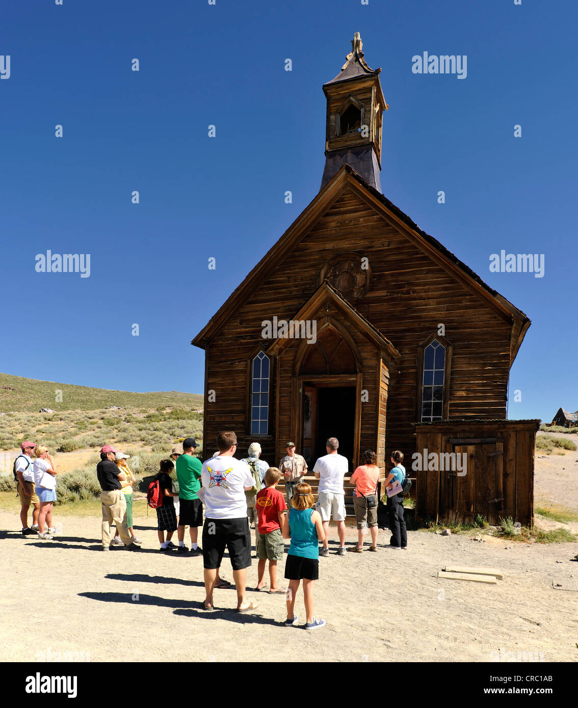 Ranger as a guide for tourists, Methodist Church, ghost town of Bodie, a former gold mining town ...