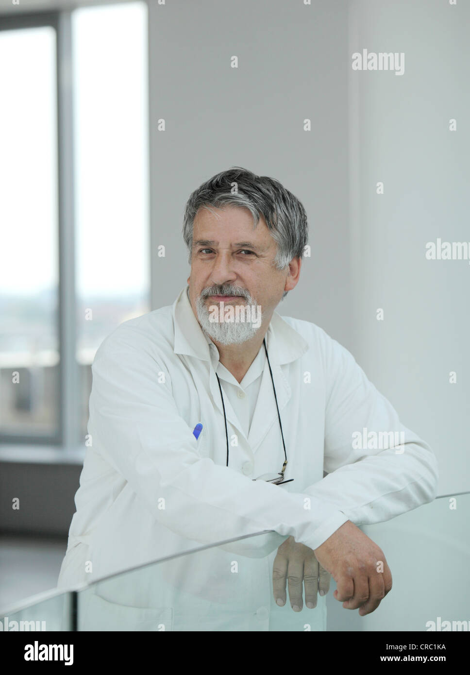Renowned scientist/doctor in a research center/hospital looking ...