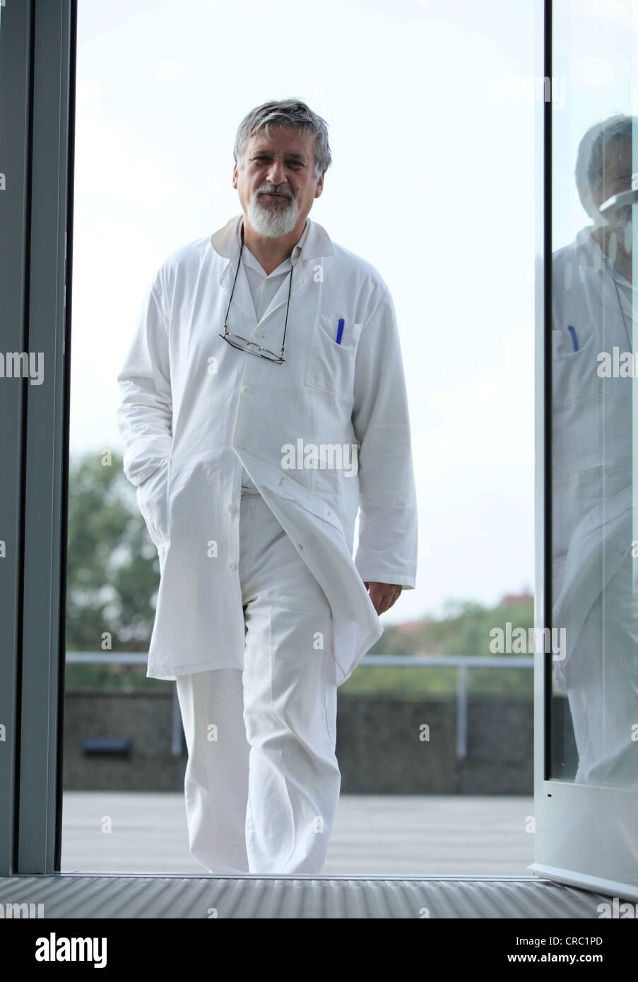 Renowned scientist/doctor in a research center/hospital looking ...