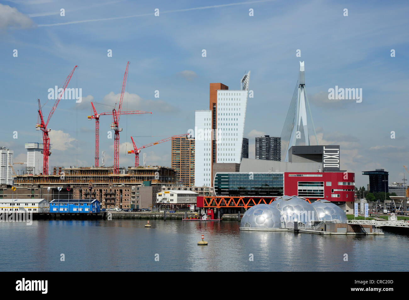 Modern architecture along the Nieuwe Maas River, construction site of ...