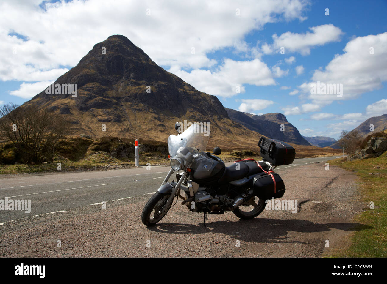touring bmw motorcycle parked on the a82 road in front of buachaille ...