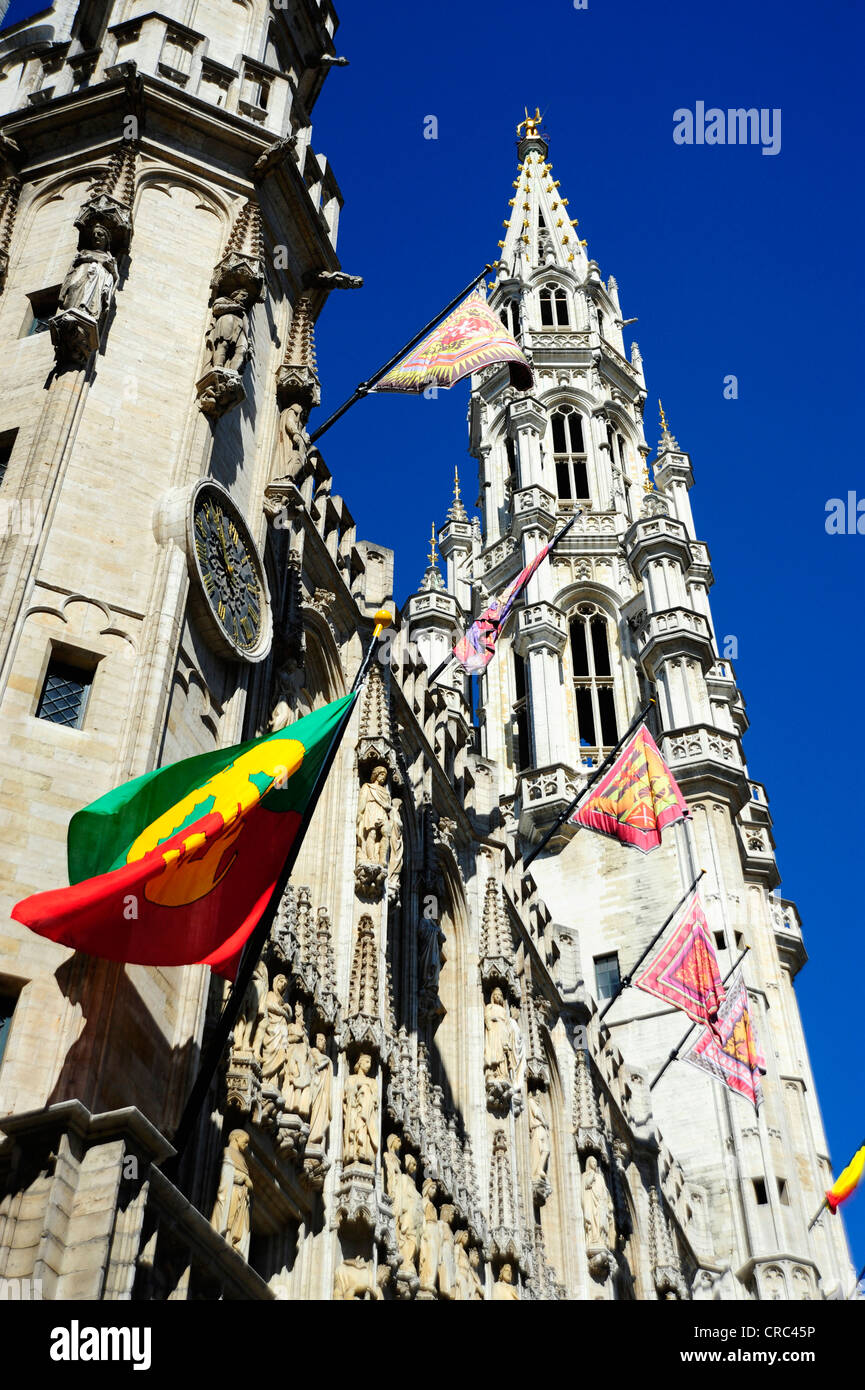 Town Hall with traditional flags and a Gothic style tower, Hotel de ...