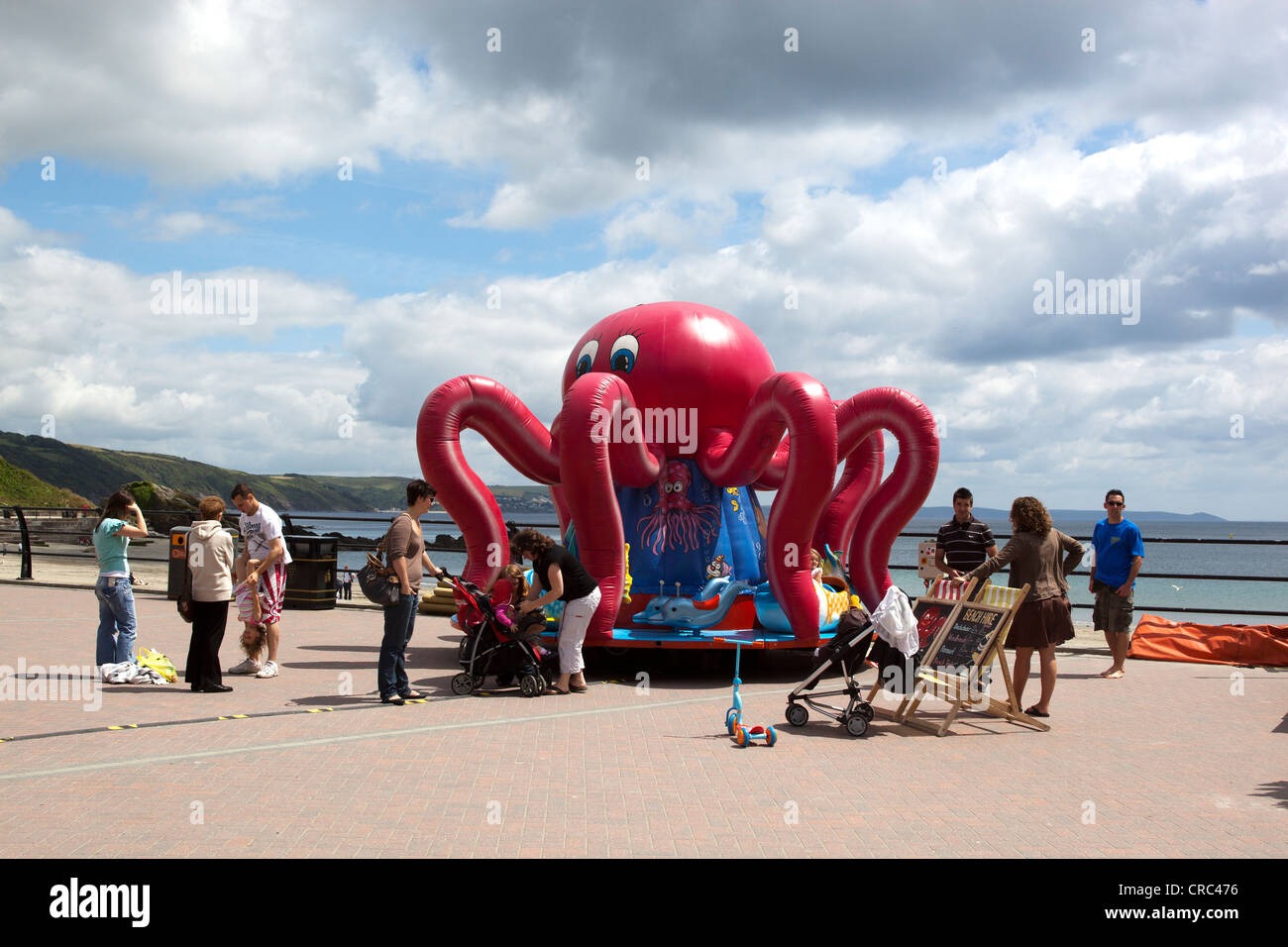 Seafront Ride at Looe Stock Photo - Alamy
