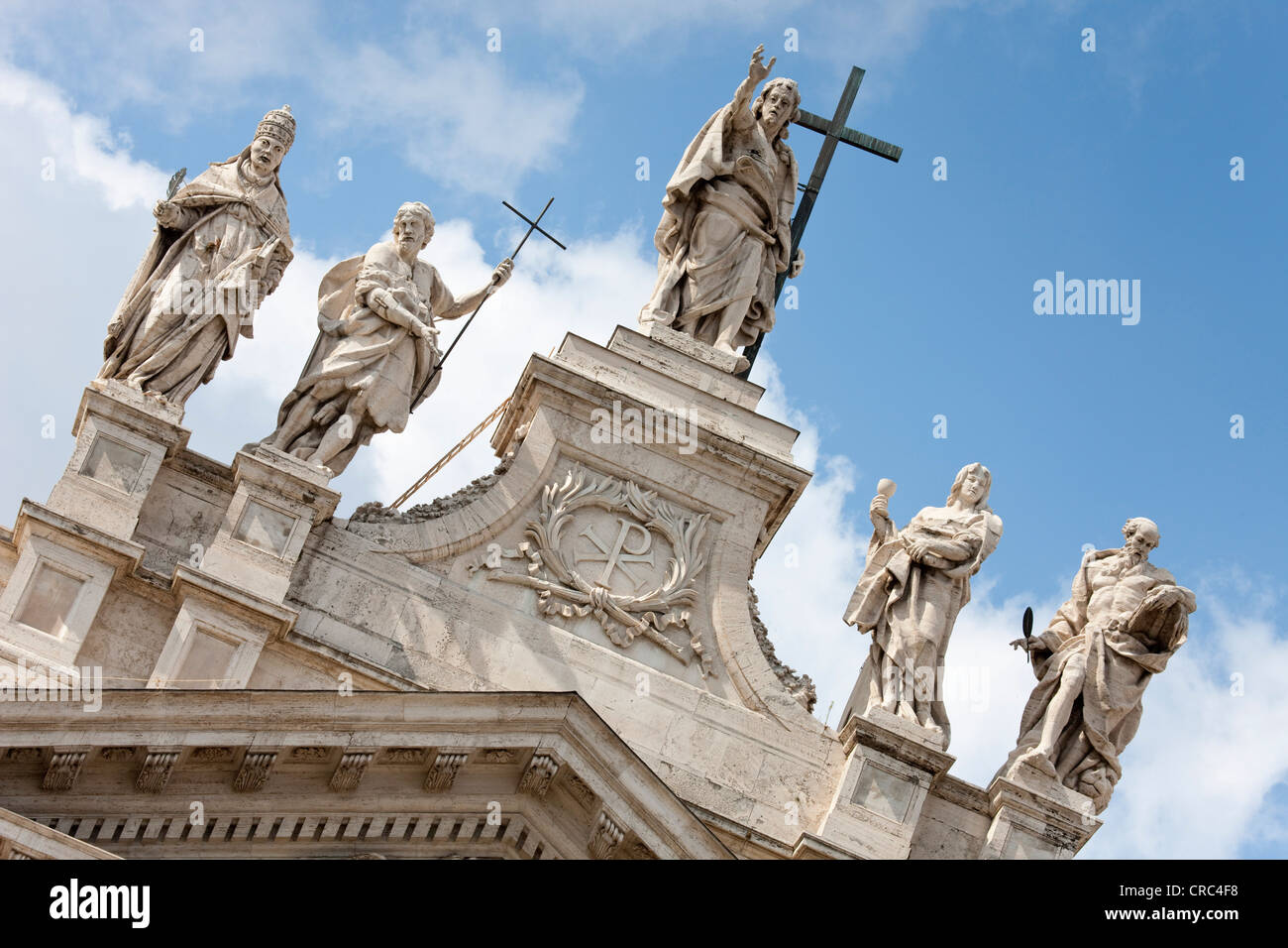 Christ and figures of the apostles on the facade of the Basilica San ...