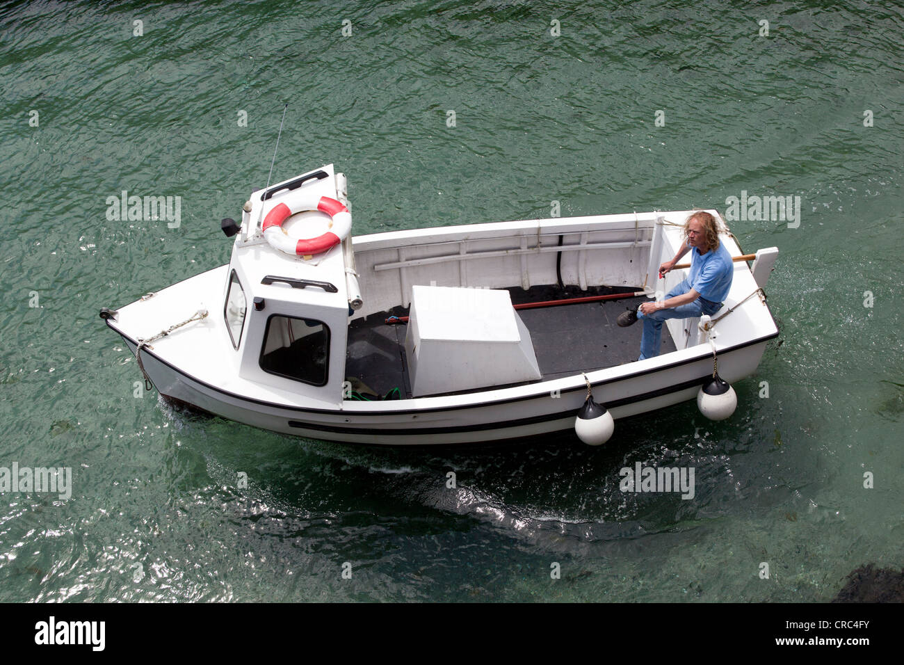 Man in motor boat hi-res stock photography and images - Alamy