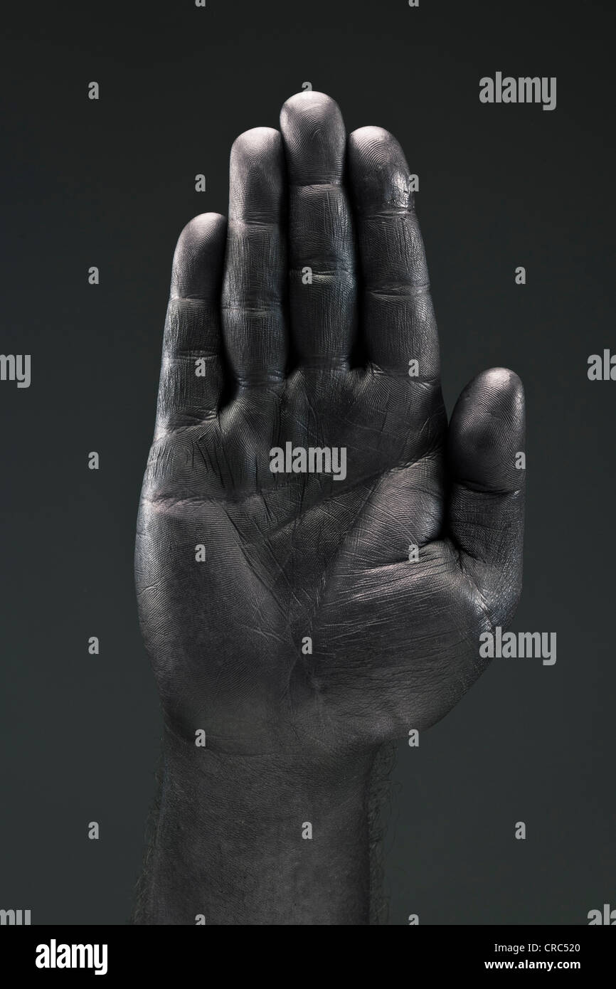 Black painted hand arm hi-res stock photography and images - Alamy
