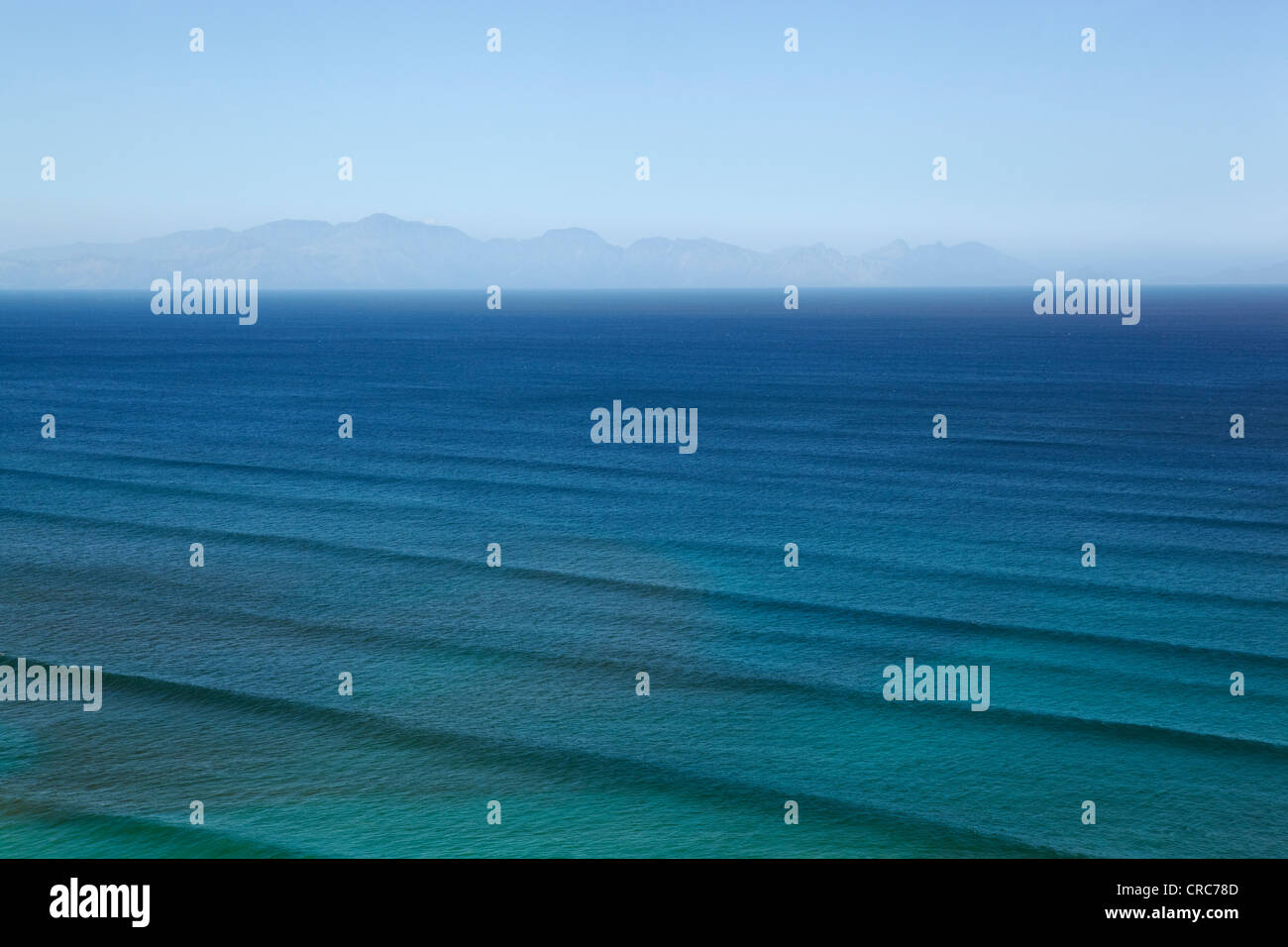 Waves rippling on calm ocean waters Stock Photo - Alamy