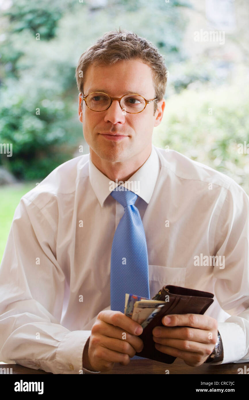 Out of wallet hi-res stock photography and images - Alamy