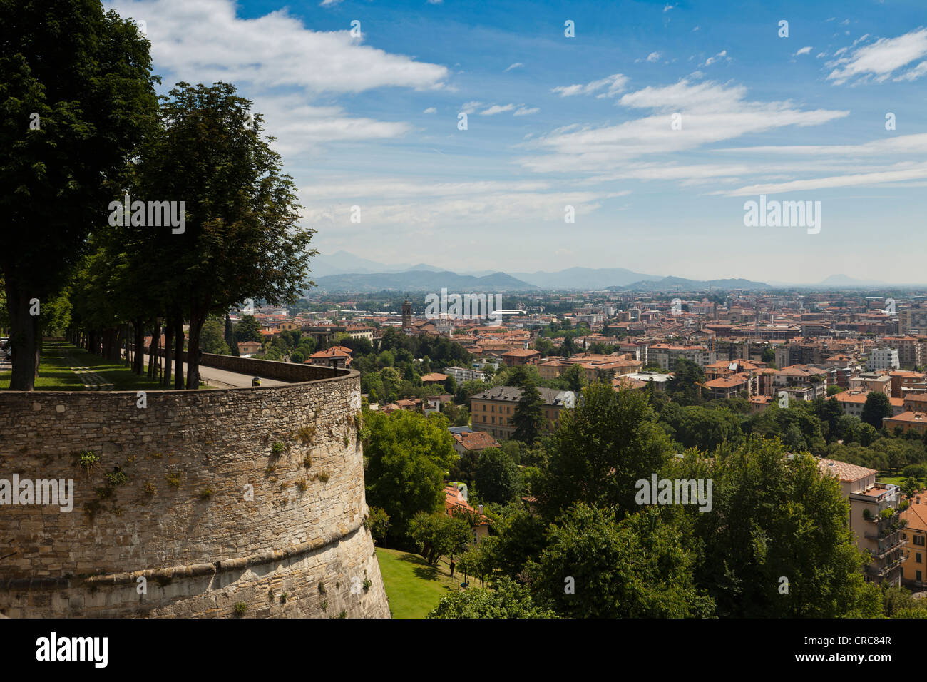 Stone wall overlooking city Stock Photo - Alamy