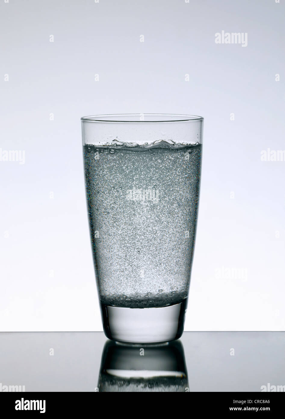Close up of glass of sparkling water Stock Photo - Alamy