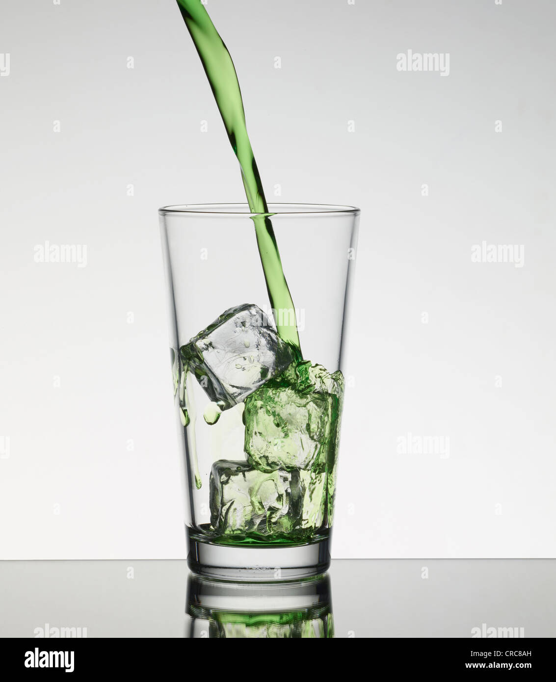 Liquid pouring over ice close up hi-res stock photography and images ...
