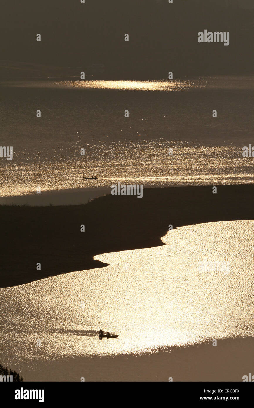 Dawn reflections on Umiam Lake, Umbir, Shillong, Meghalaya, India Stock ...