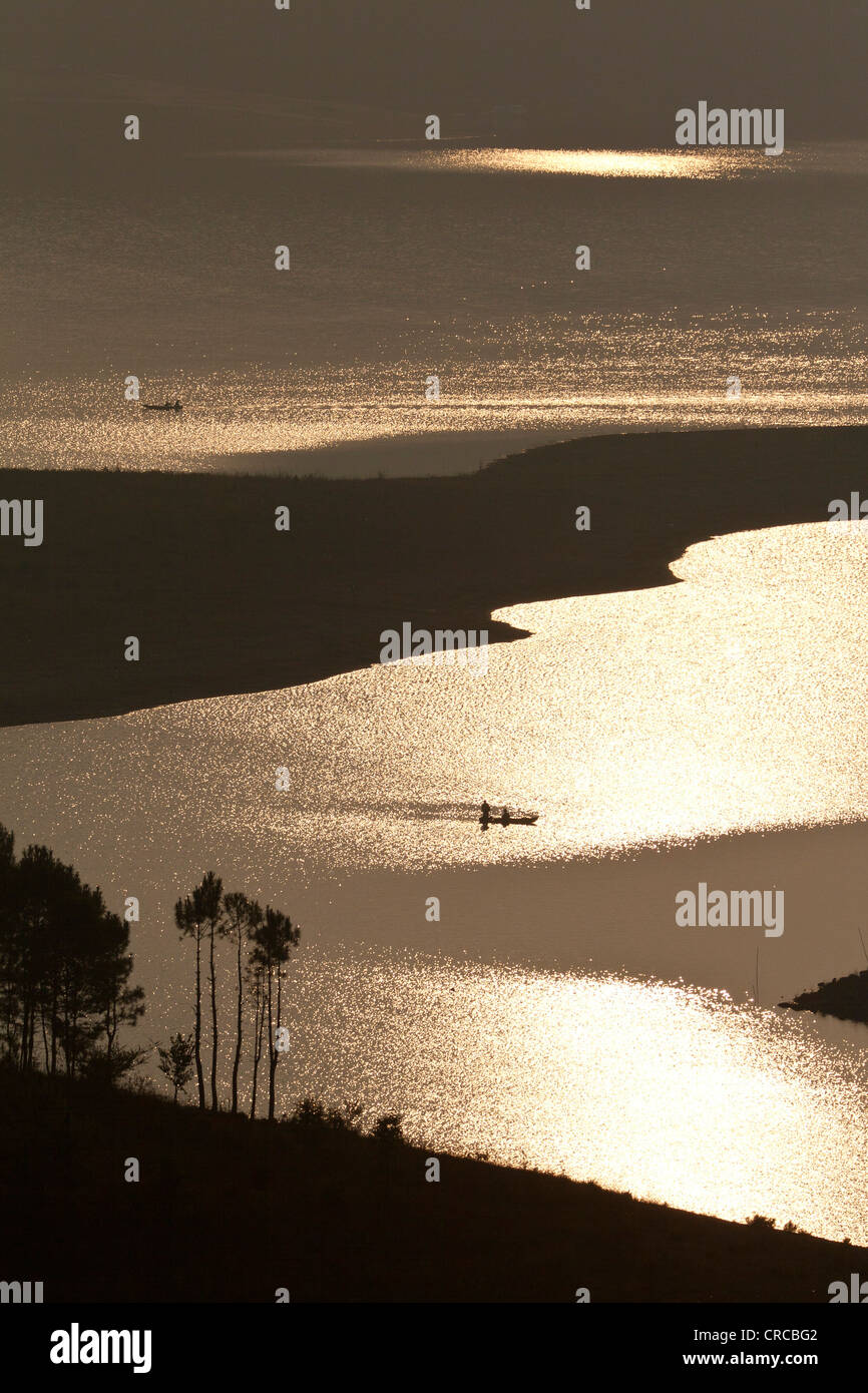 Dawn reflections on Umiam Lake, Umbir, Shillong, Meghalaya, India Stock ...